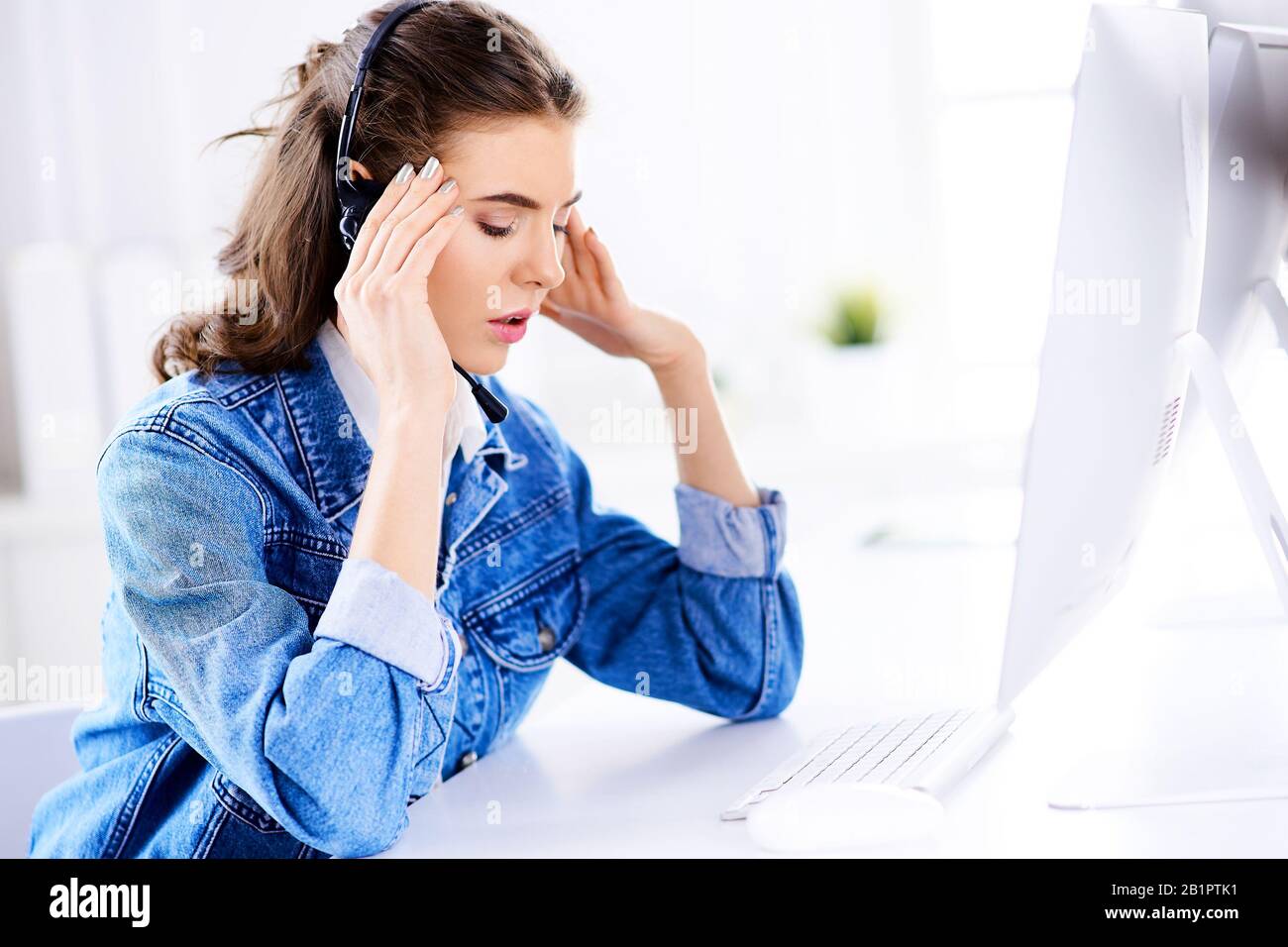 Tired receptionist hi-res stock photography and images - Alamy