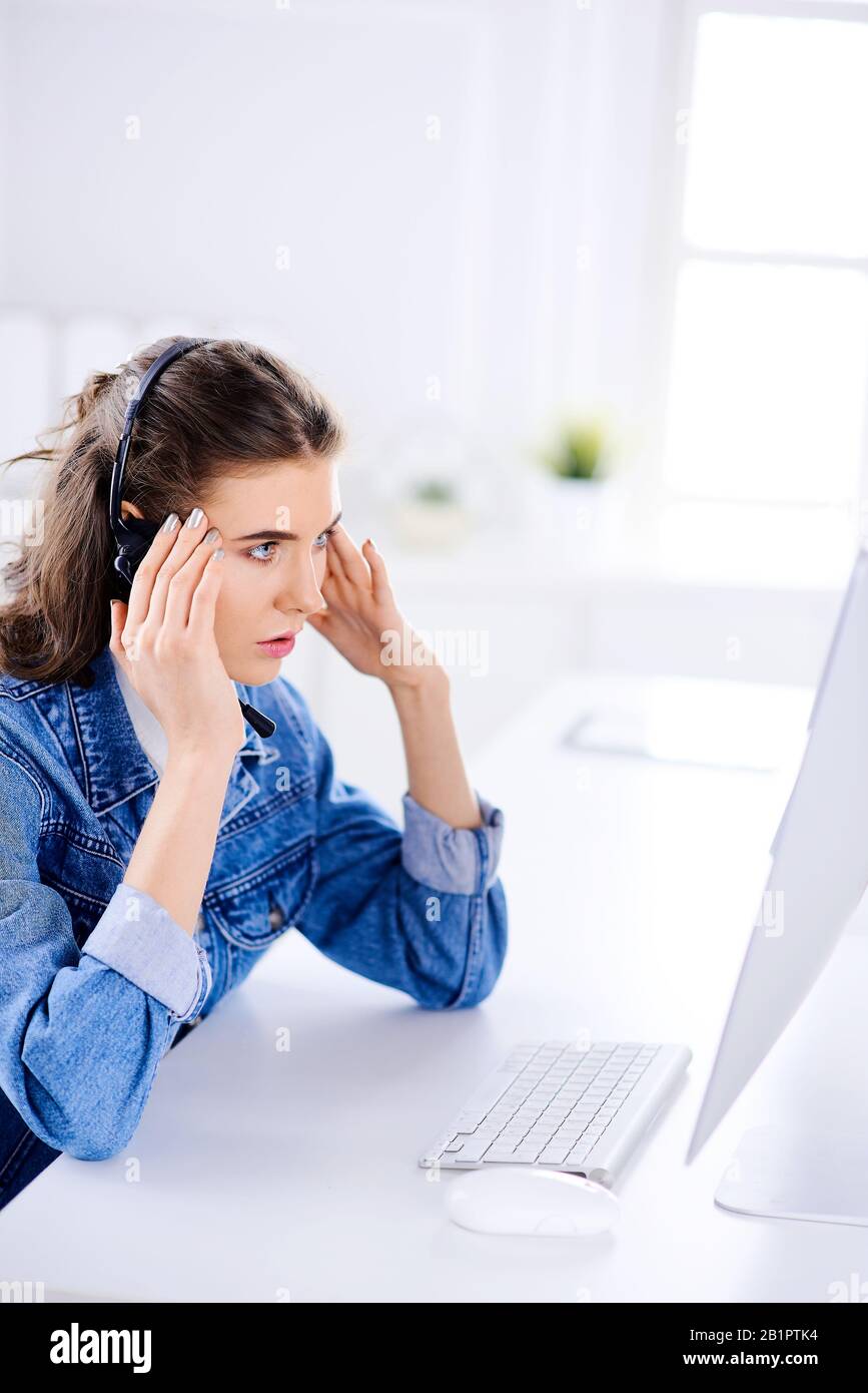 Tired receptionist hi-res stock photography and images - Alamy