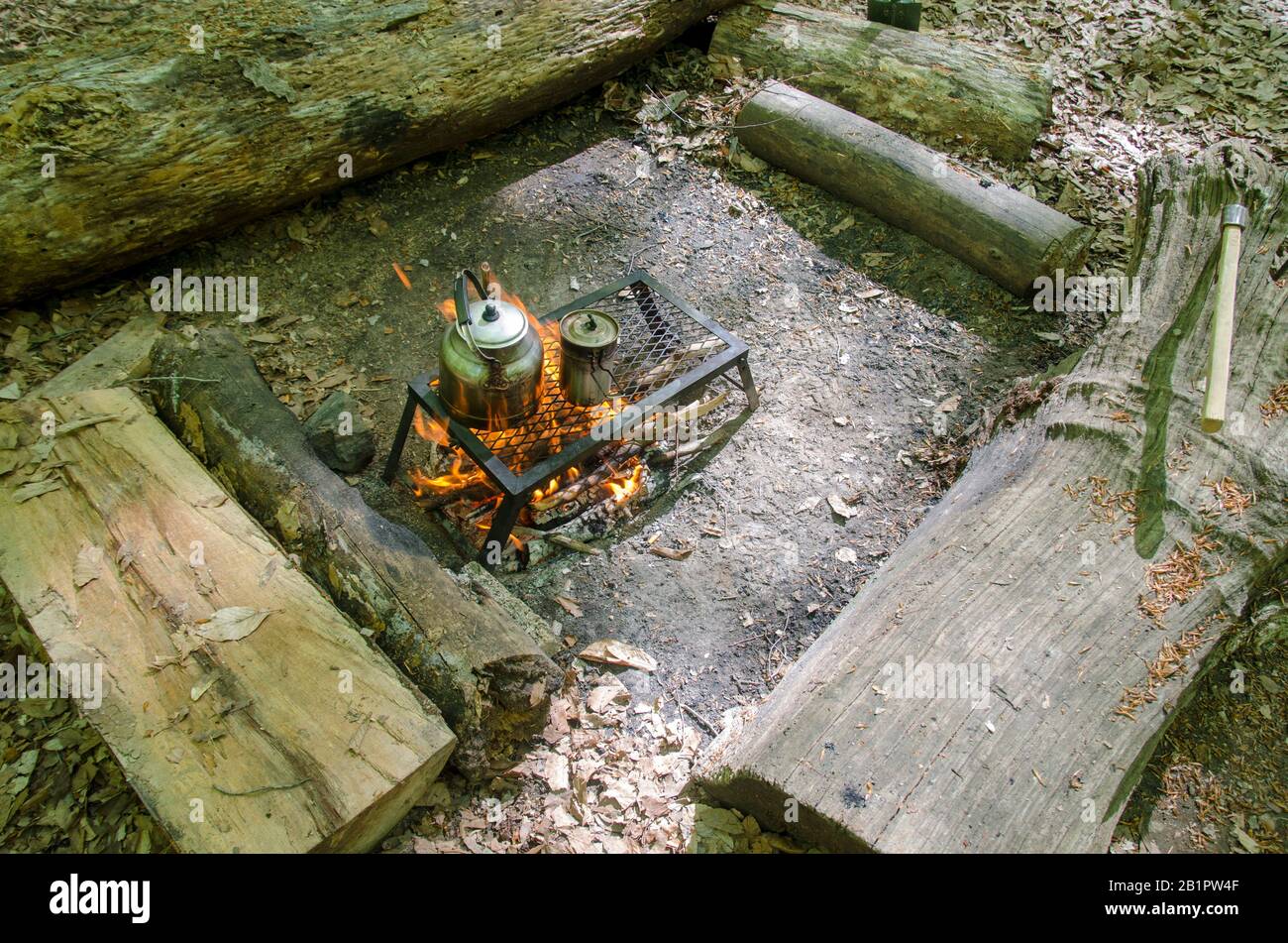 Cooking Tea in Camping Stock Photo - Alamy