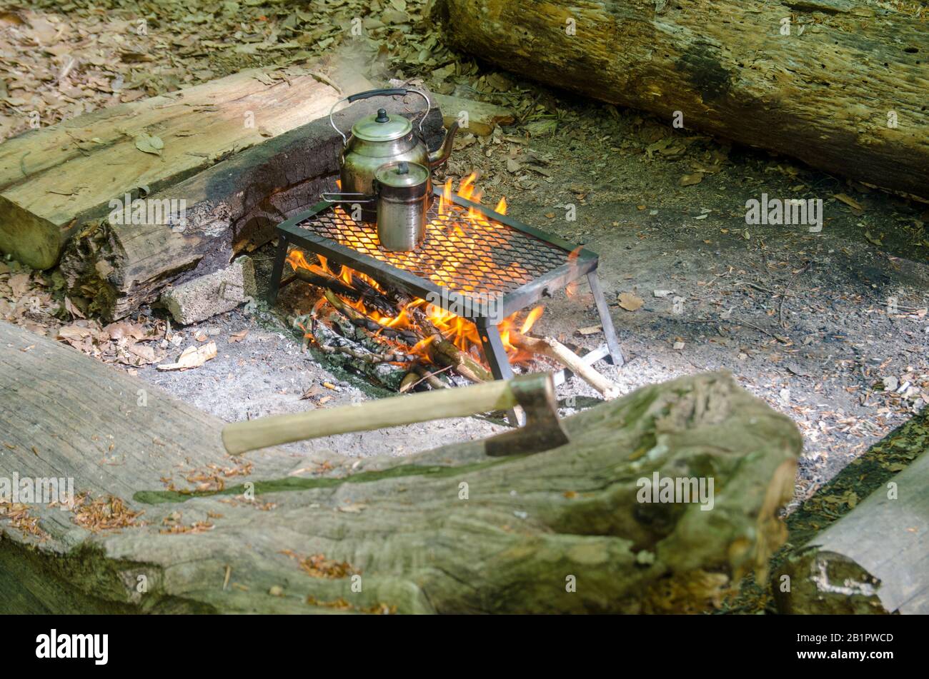 Cooking Tea in Camping Stock Photo - Alamy