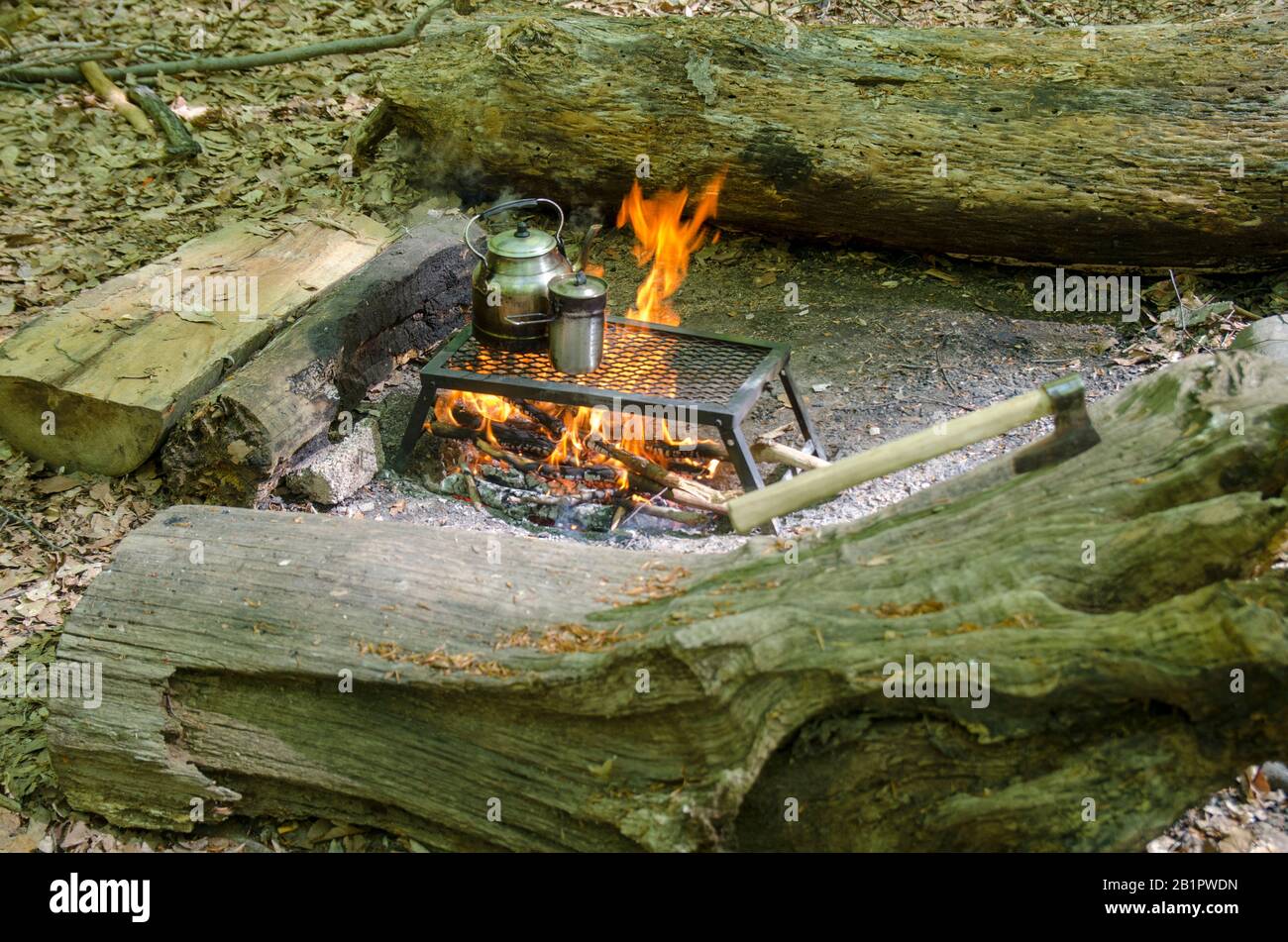 Cooking Tea in Camping Stock Photo - Alamy