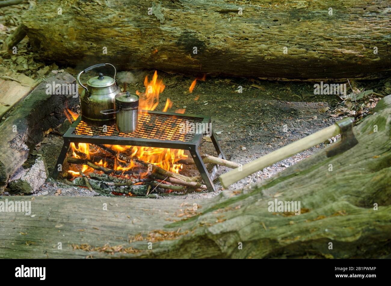 Cooking Tea in Camping Stock Photo - Alamy