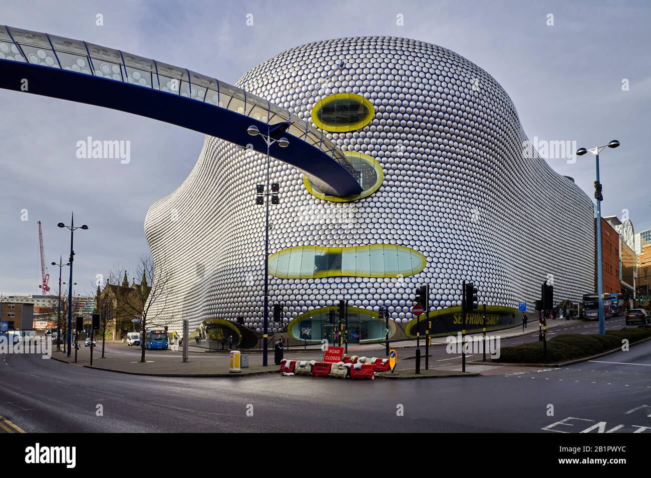 The Selfridges building and car park bridge with circular tiles in the ...