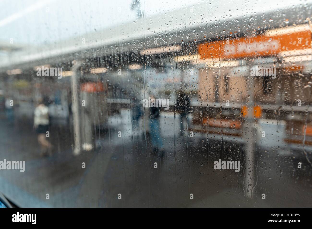 Train window when raining day Stock Photo - Alamy