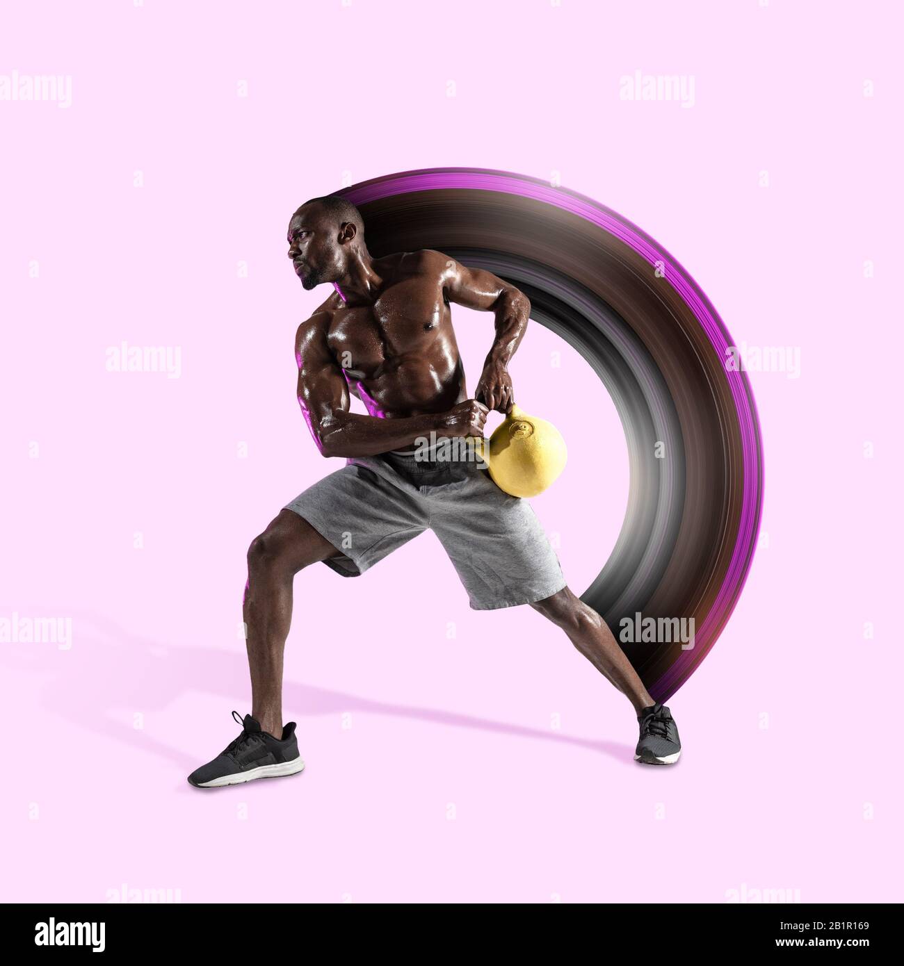Concept of motion and action in sport. Young male athlete training with ...