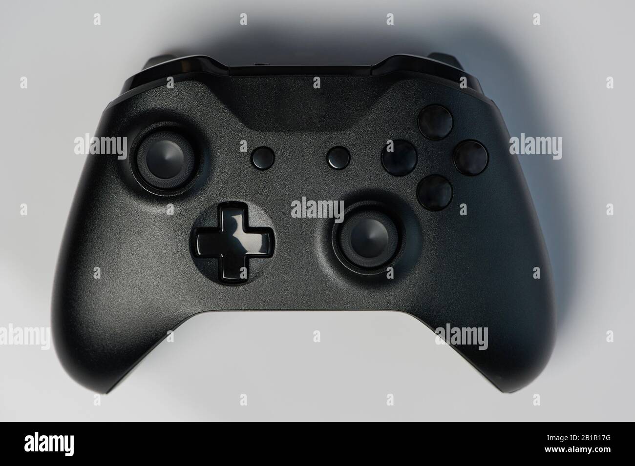 Black video game controller close up view isolated Stock Photo - Alamy