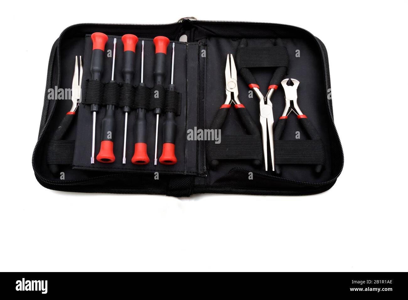 A small toolkit isolated on a white background Stock Photo - Alamy