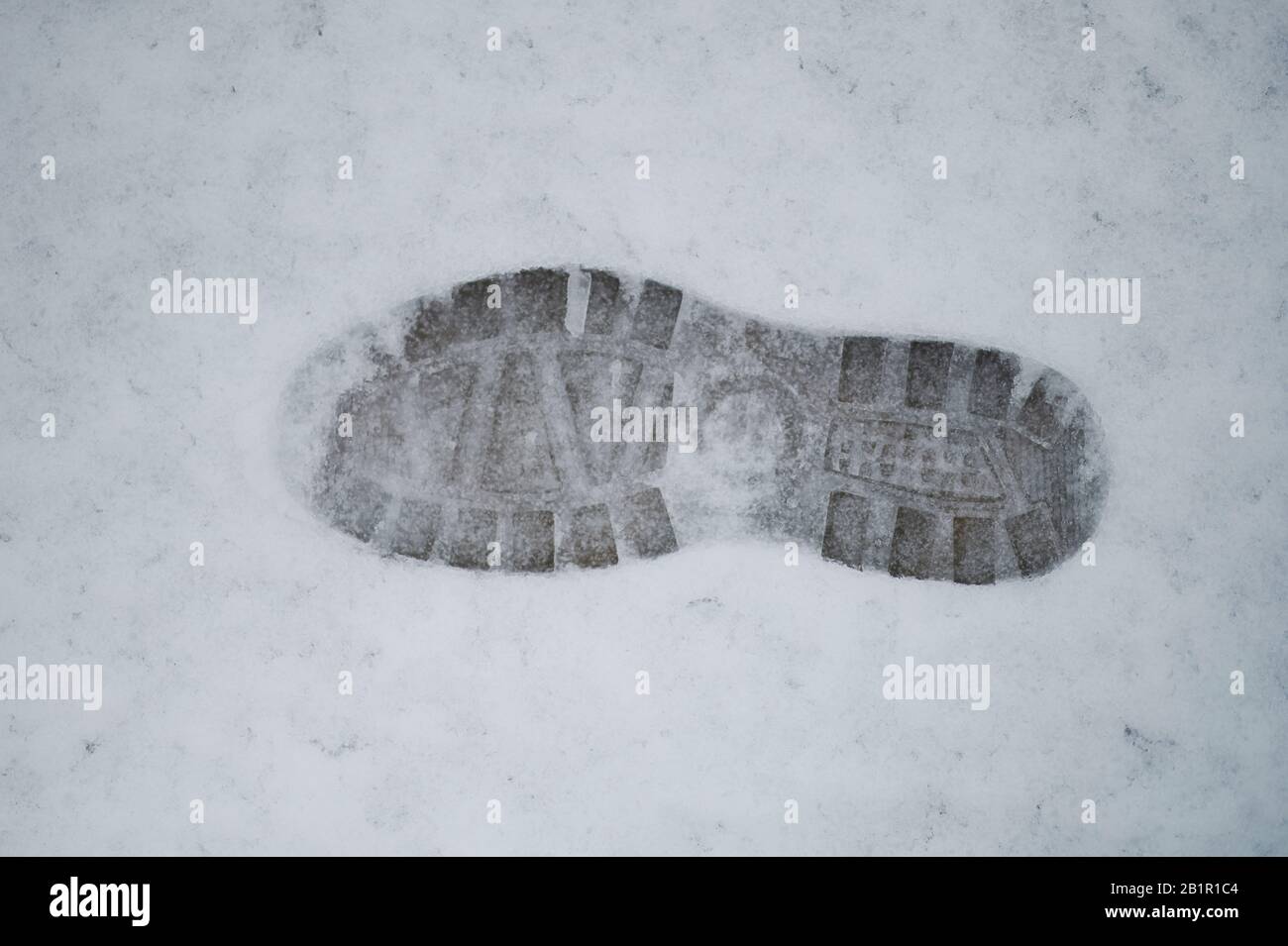 Shoe trace print on snow close up view. Mark of winter sole shoe Stock ...