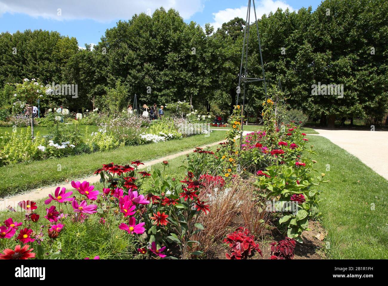 PARIS, FRANCE - JULY 24, 2011: People stroll in Garden of Plants in ...