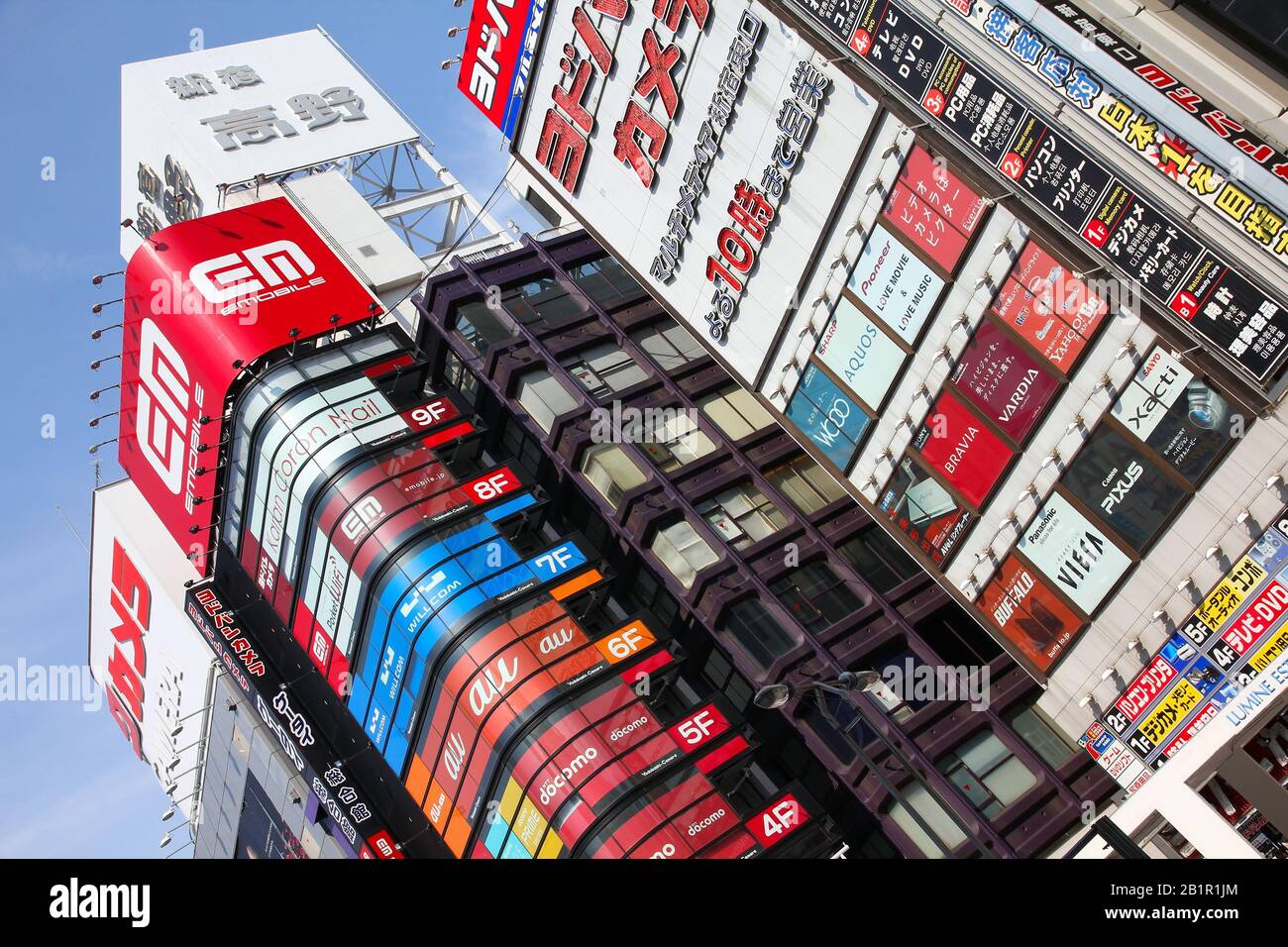 TOKYO, JAPAN - MAY 11, 2012: Colorful advertisements in Shinjuku ...