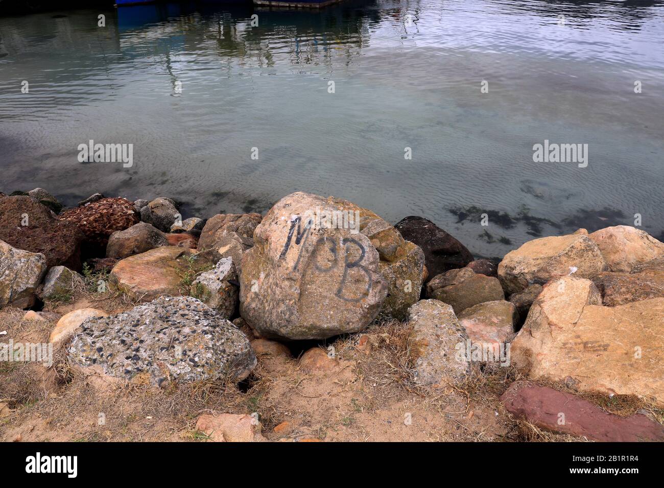 "MOB" graffiti on rocks in Hout Bay Harbour, Cape Town, South Africa ...