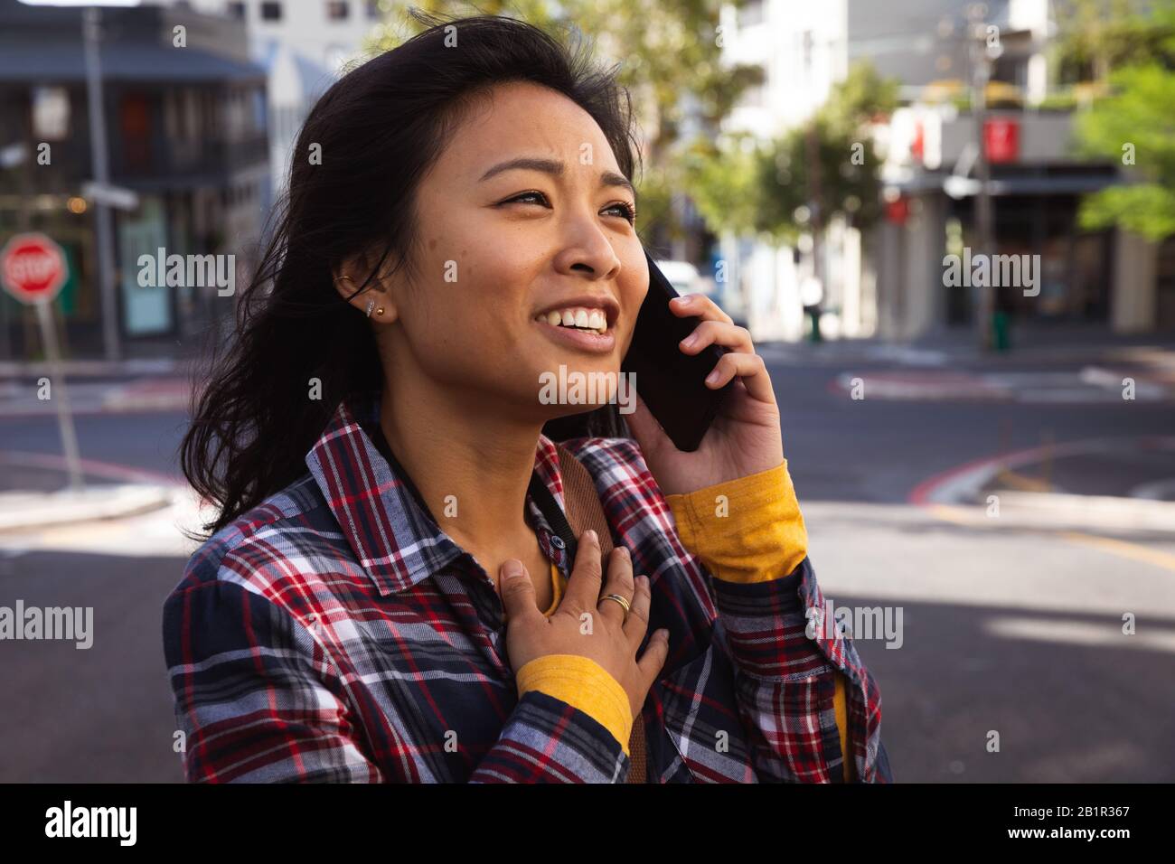 Happy brunette woman talking hi-res stock photography and images - Alamy