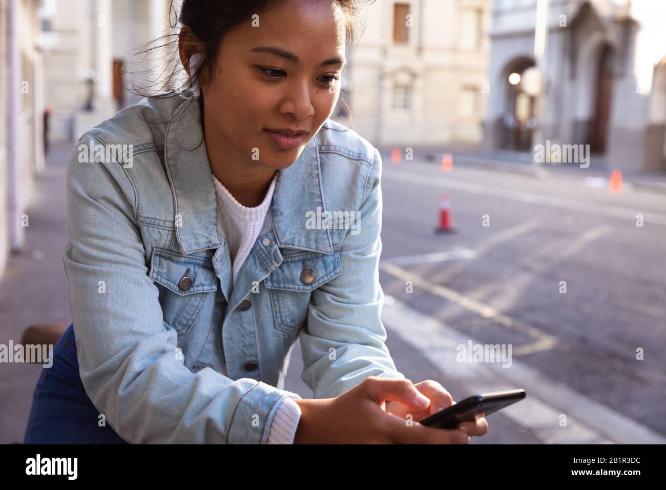 Female asian woman using green hi-res stock photography and images - Alamy