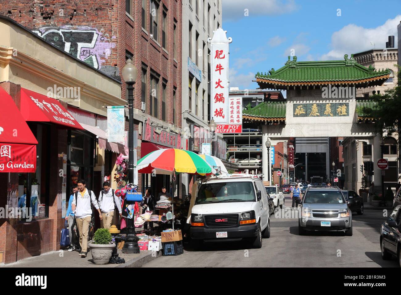 BOSTON, USA - JUNE 8, 2013: People visit Chinatown in Boston. Boston's ...