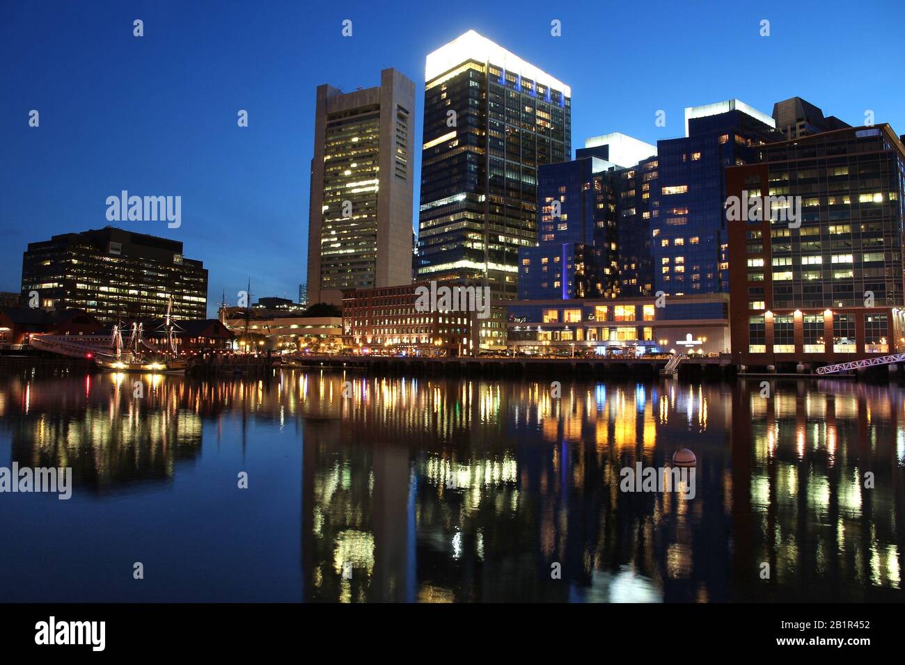 Boston night skyline - evening Waterfront view of the city Stock Photo ...