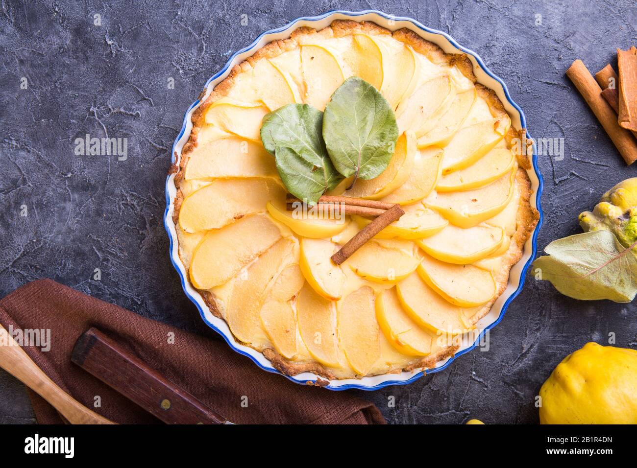 quince tart with custard open and shortcrust pastry and cinnamon Stock ...
