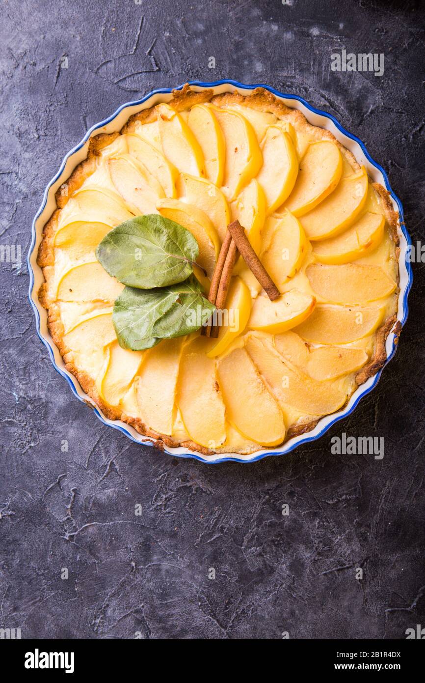 quince tart with custard open and shortcrust pastry and cinnamon Stock ...
