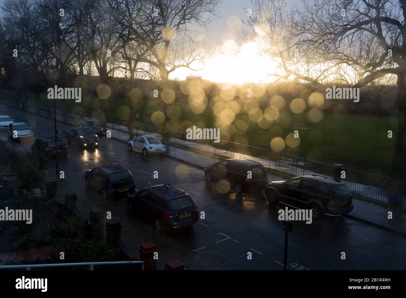 An aerial view of parked cars on a south London street, flooded by ...