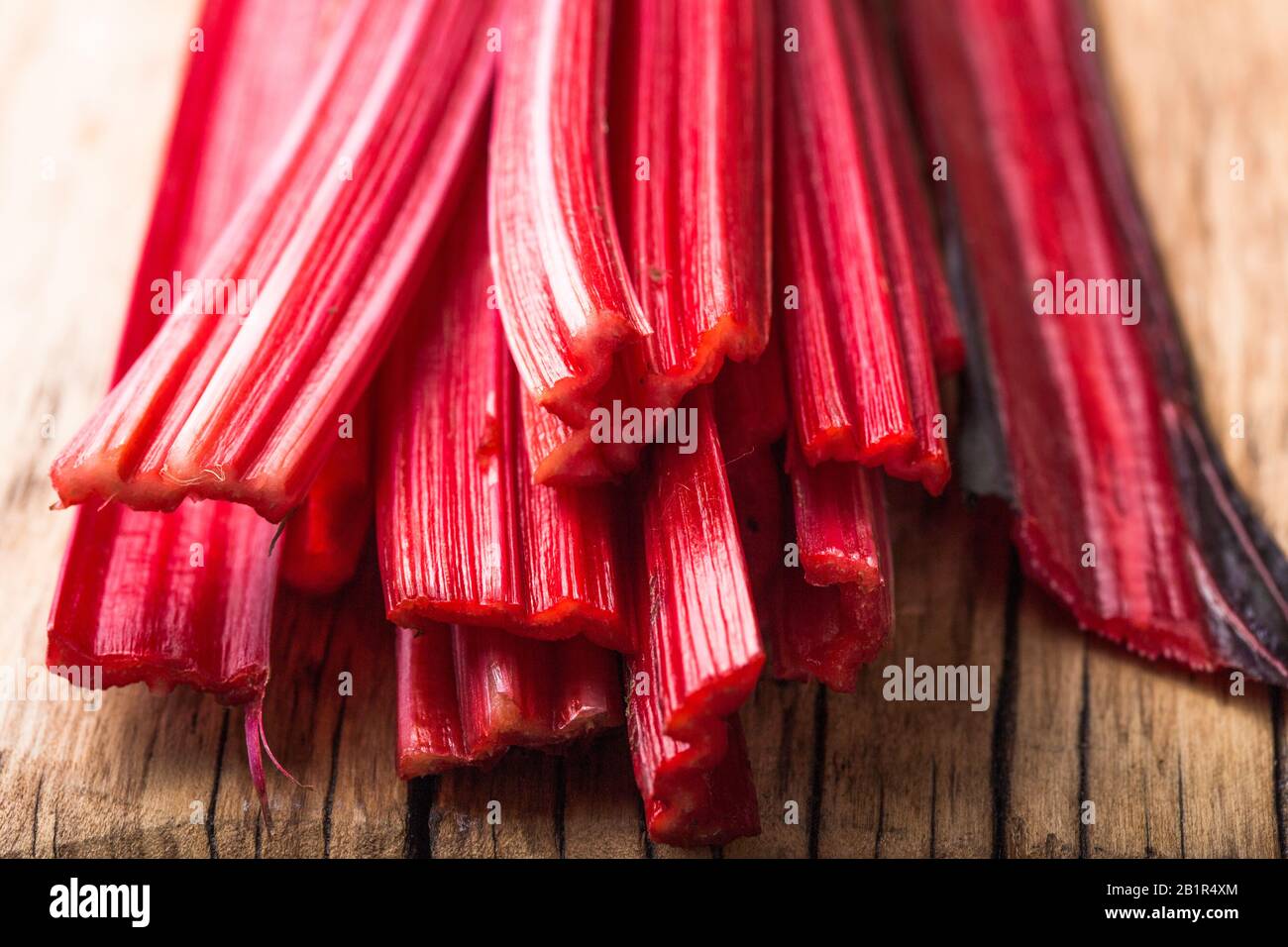 Fresh raw leaves of swiss chard, beets, mangold, on a concrete table ...