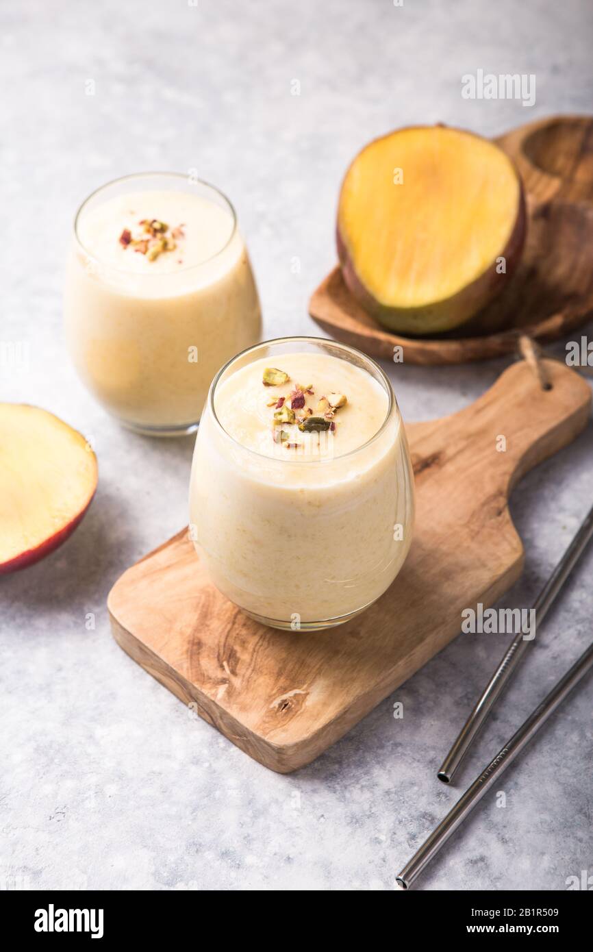 Mango Lassi, yogurt or smoothie. Healthy probiotic cold summer drink ...