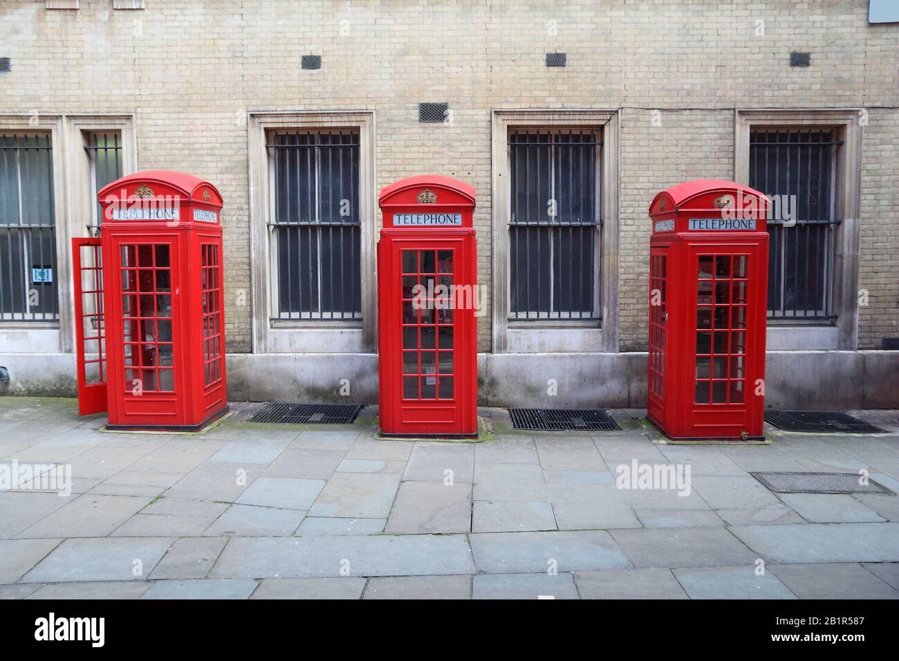 Red telephone box row in London, UK Stock Photo - Alamy