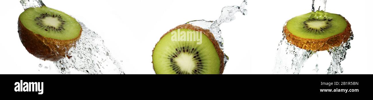 Fresh pieces of kiwi in water splash, isolated on white background ...
