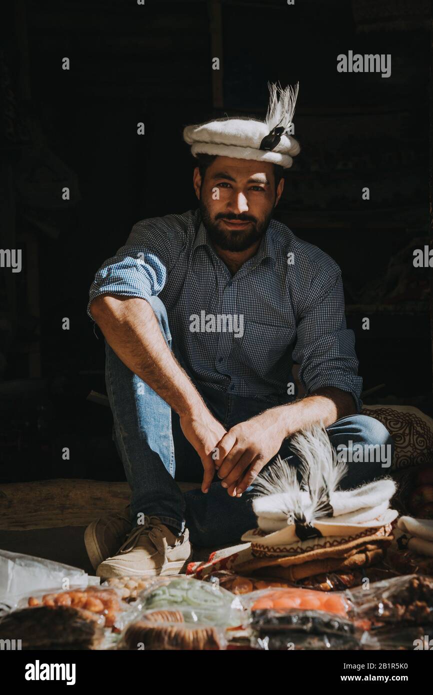 Pakistani man sitting hi-res stock photography and images - Alamy