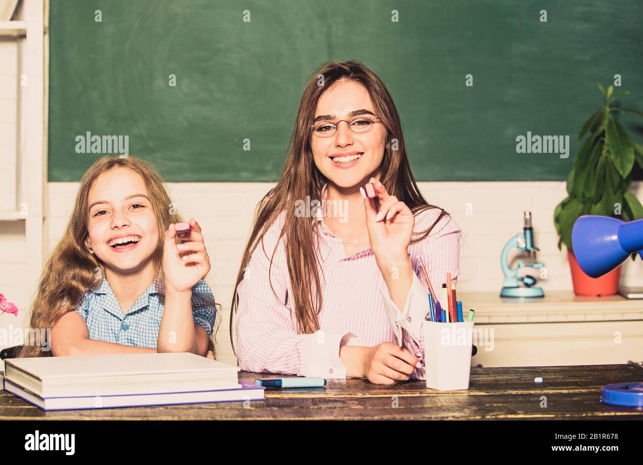 Help with homework. Homework project. Sister helping with learning ...