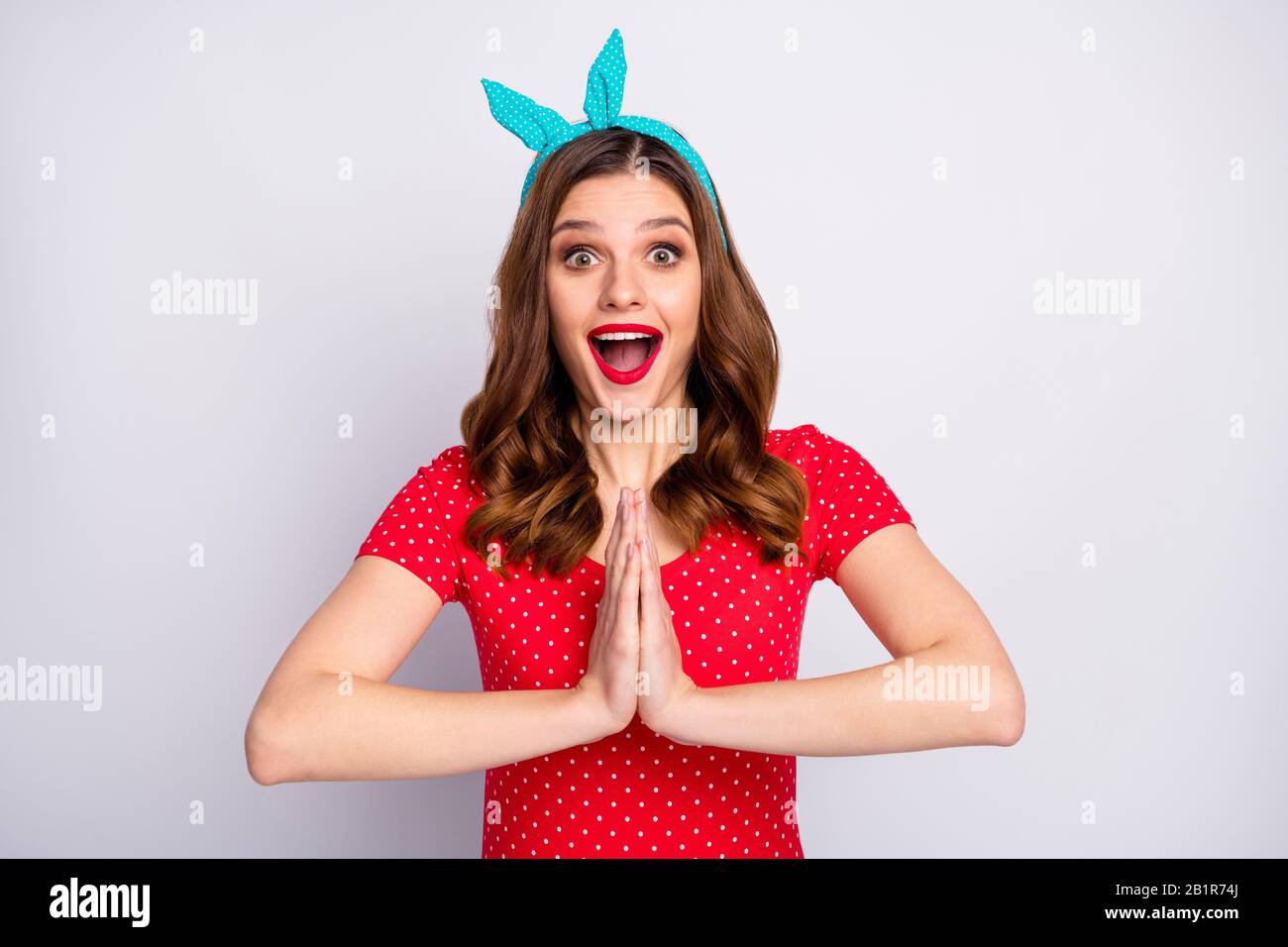 Portrait of astonished funky ginger hair girl put hands together get ...