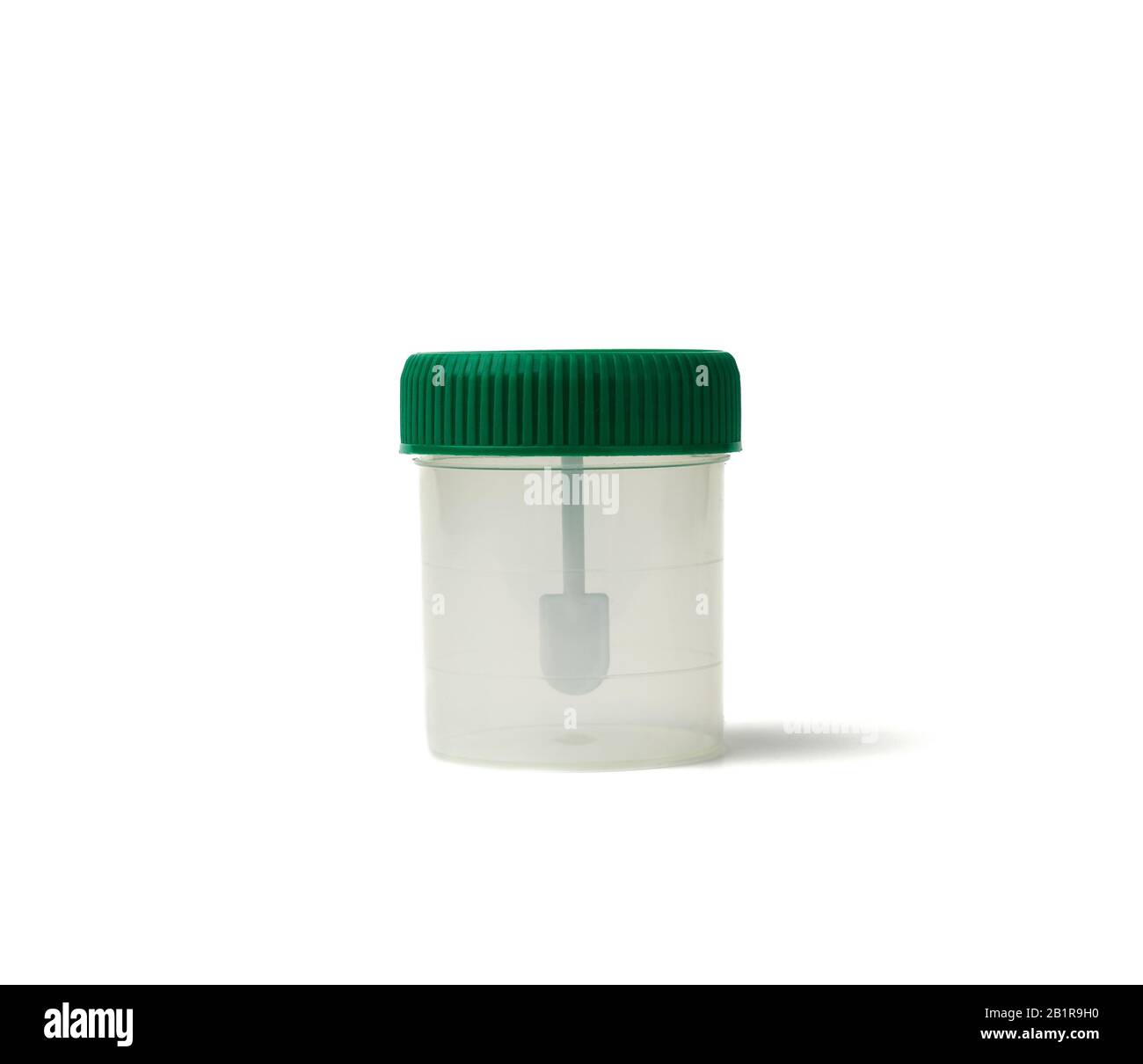 plastic transparent jar with green lid for stool analysis isolated on a ...