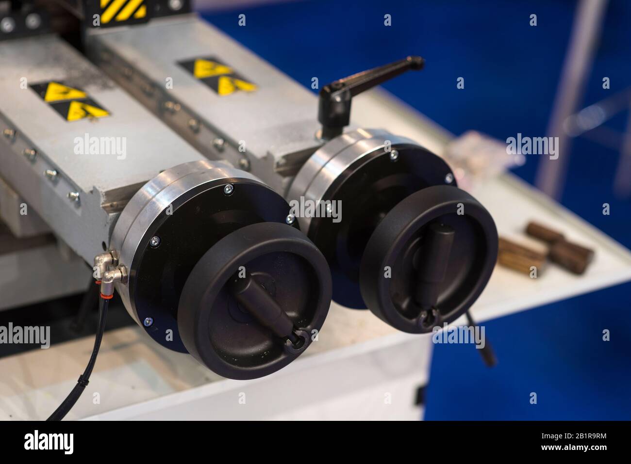 Operator machining automotive part by turning machine Stock Photo - Alamy