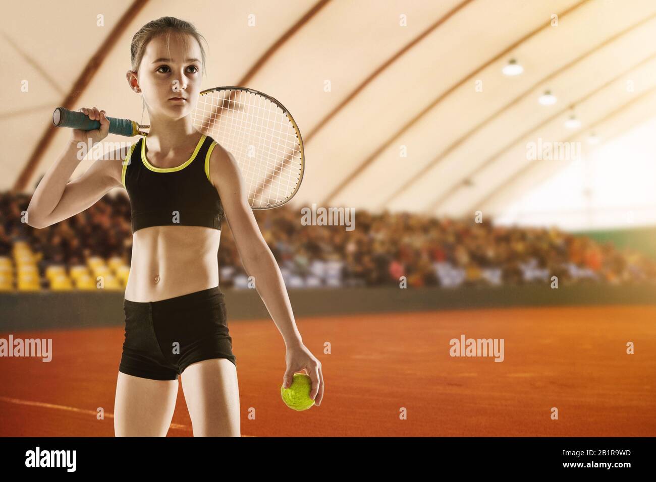 Little caucasian girl playing tennis on sport court background. Cute ...