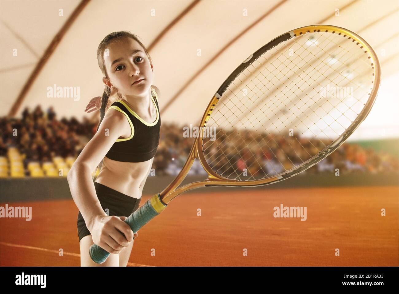Little caucasian girl playing tennis on sport court background. Cute ...
