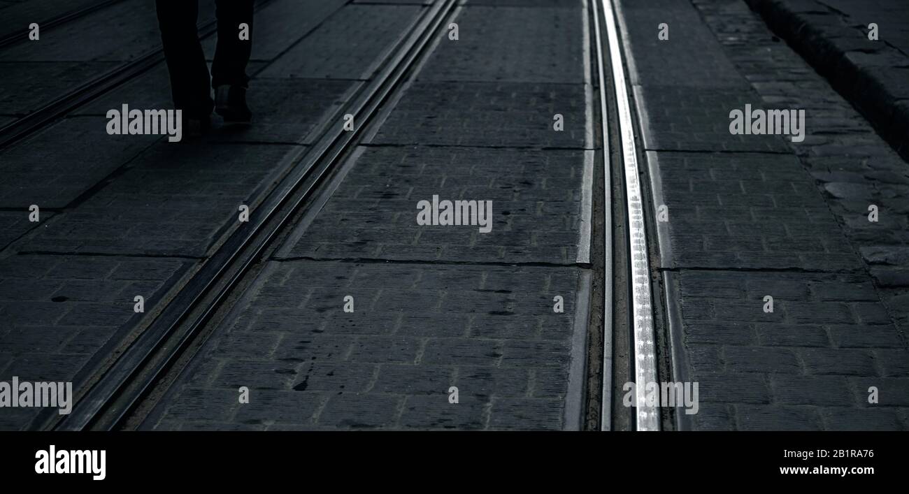 Rail and tram tracks, dark background close up Stock Photo - Alamy