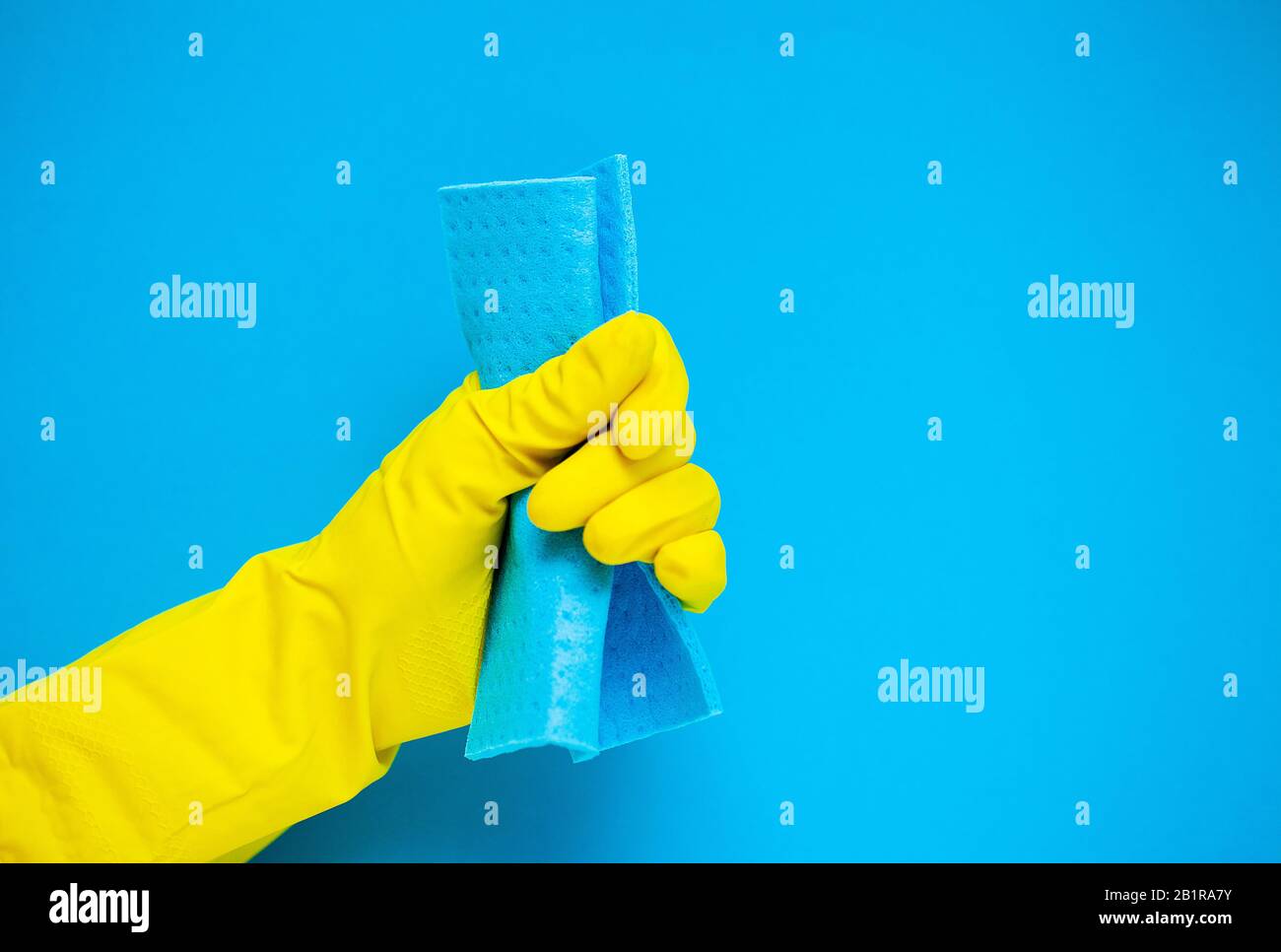 Product for professional cleaning on blue background Stock Photo - Alamy