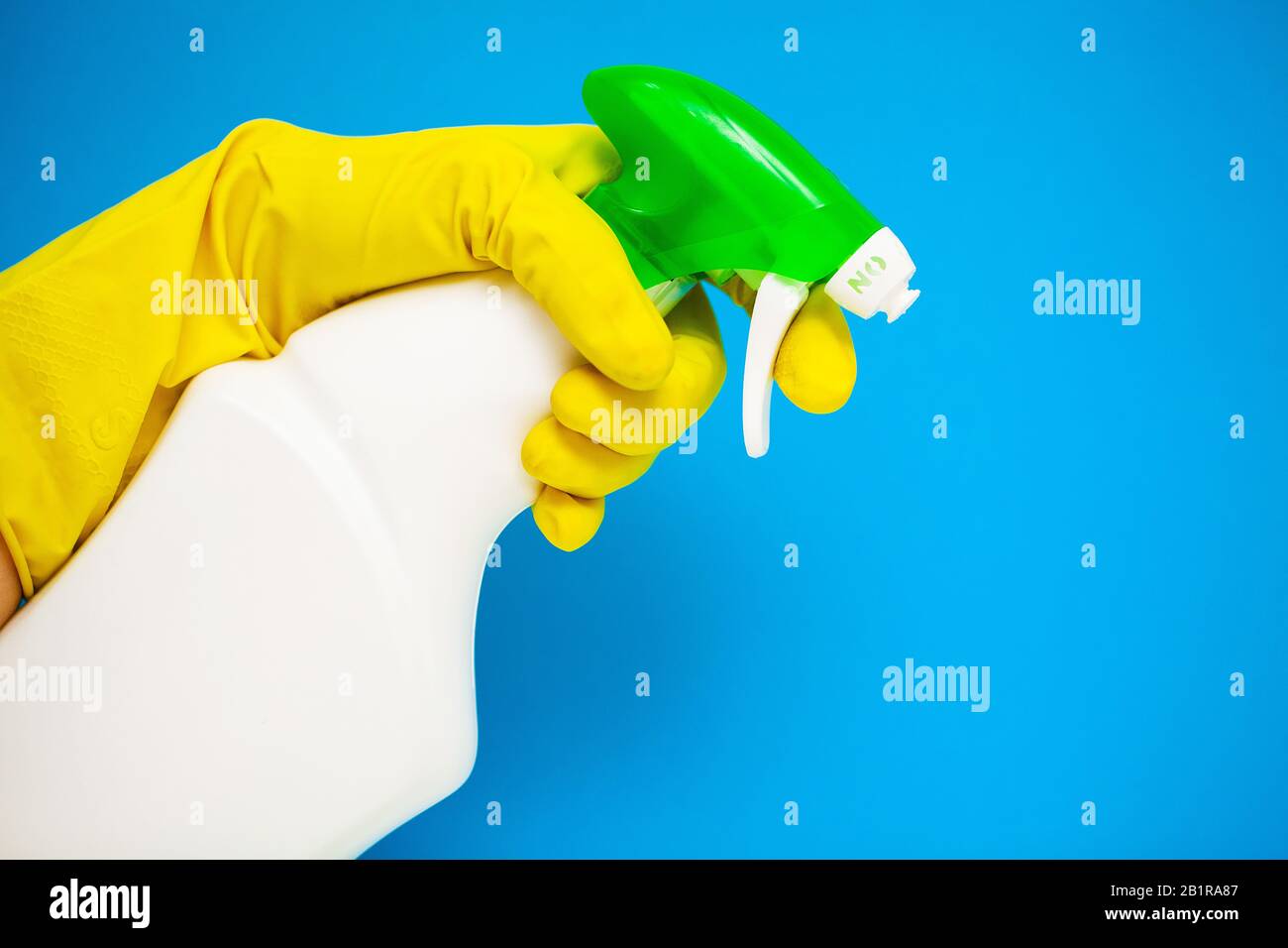 Product for professional cleaning on blue background Stock Photo - Alamy