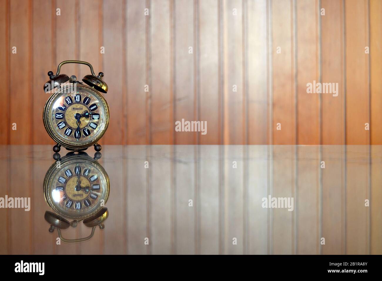 Vintage brown clock in the left side Stock Photo - Alamy
