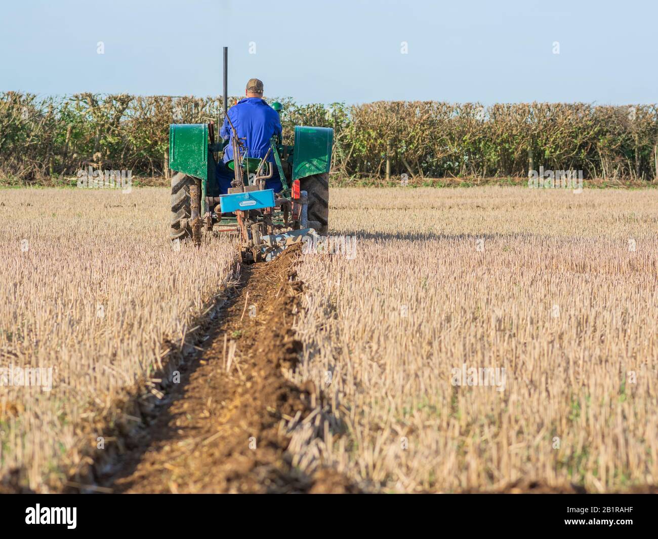 Vintage class Green Tractor Ploughing furrow field plough England ...