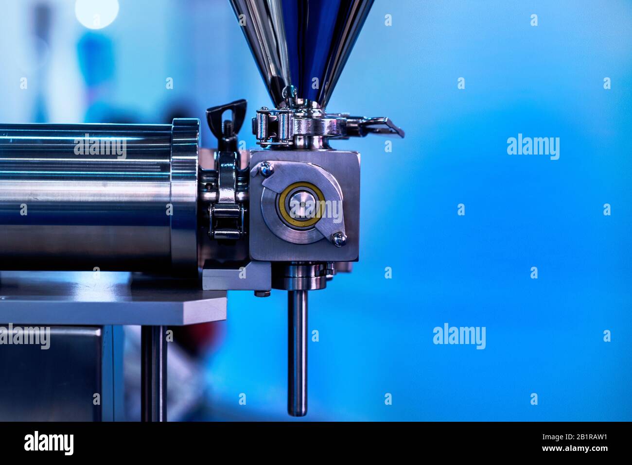 Operator machining automotive part by turning machine, Industry machine ...