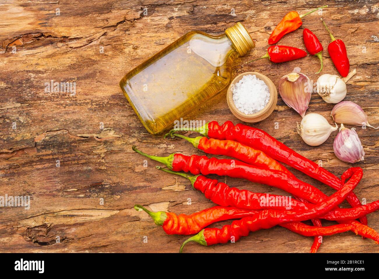 Red and orange chili pepper with garlic cooking food background ...
