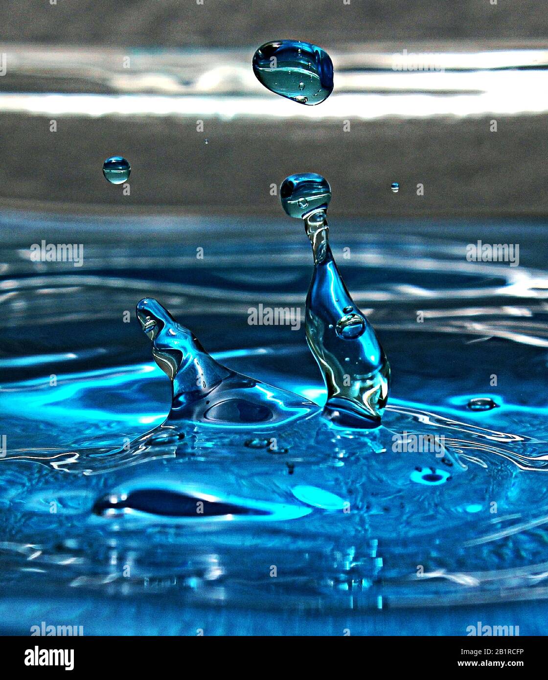 Classic blue water drop Stock Photo - Alamy