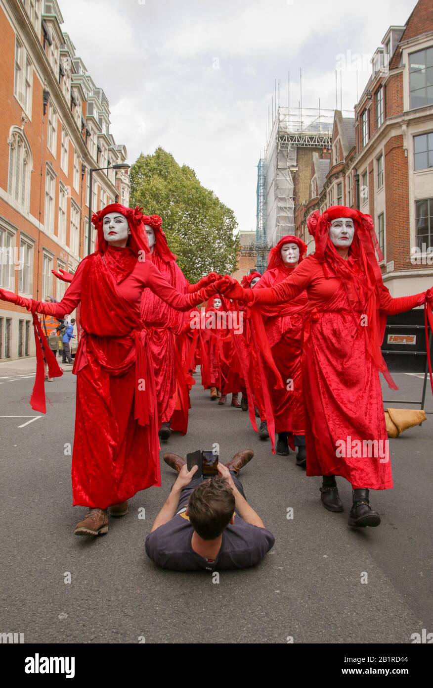 @ptrbrks 'Disruption'. The Red Rebel Brigade is a performance protest ...