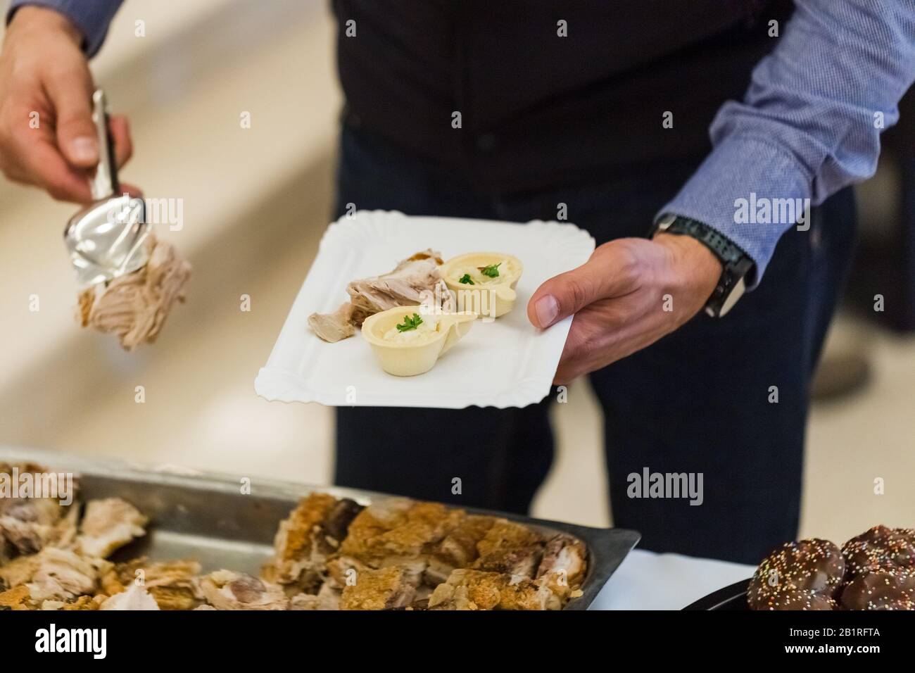 Man serving breakfast buffet hi-res stock photography and images - Alamy