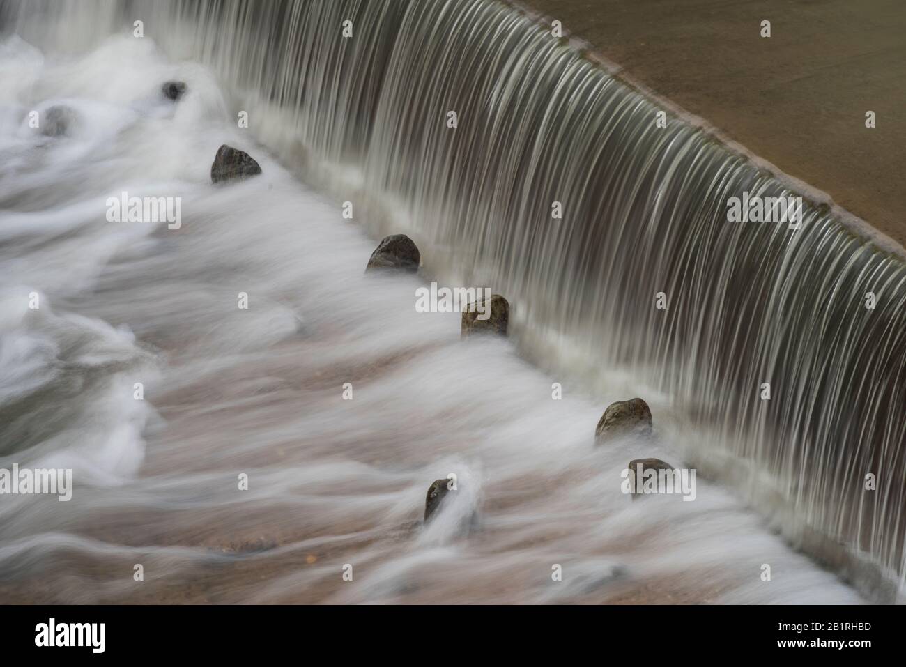 Water flowing over a stepped weir at Laxey on the Isle of Man, UK Stock ...