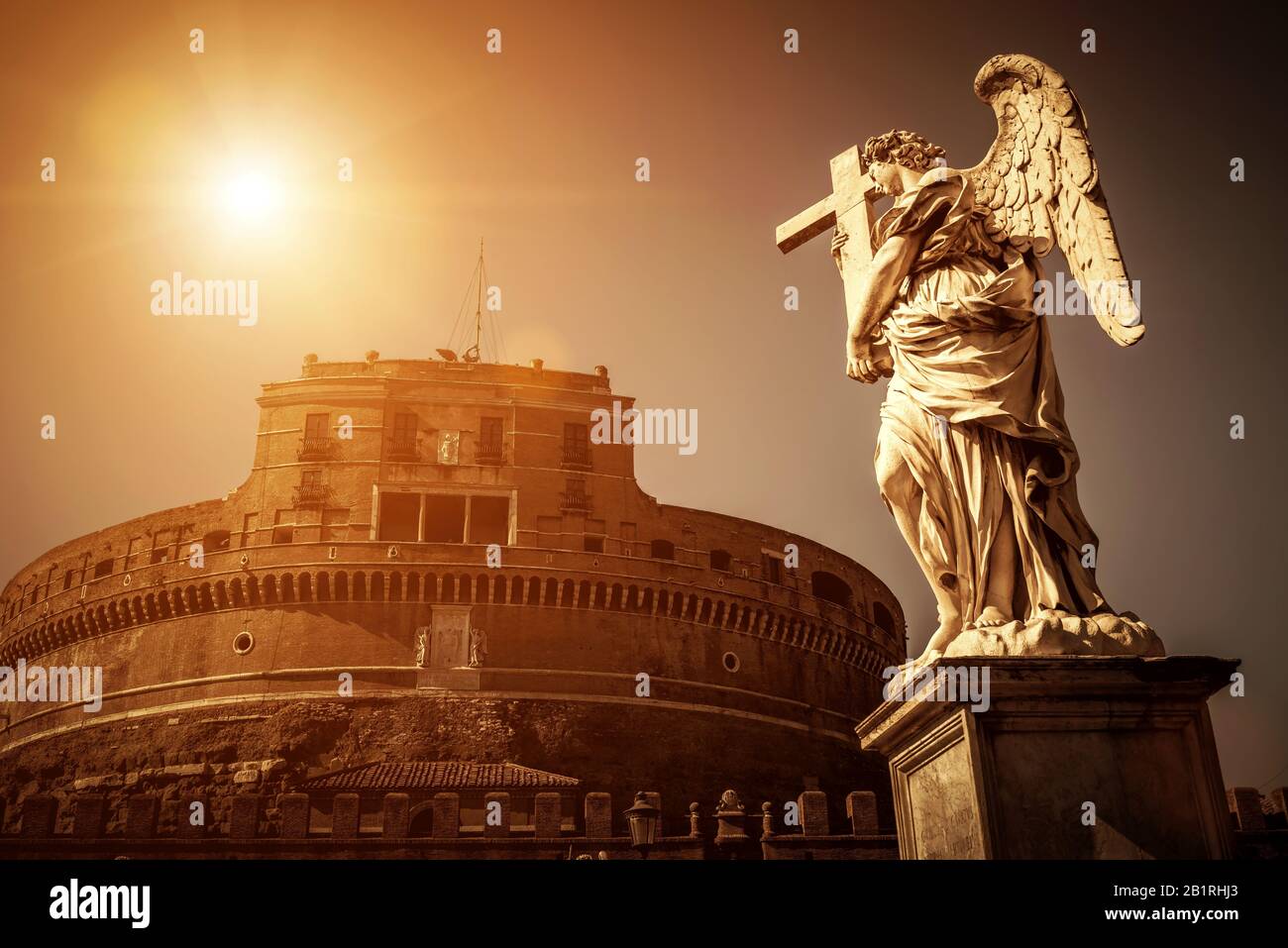 Angel statue on a bridge in front of the Castel Sant`Angelo in Rome ...