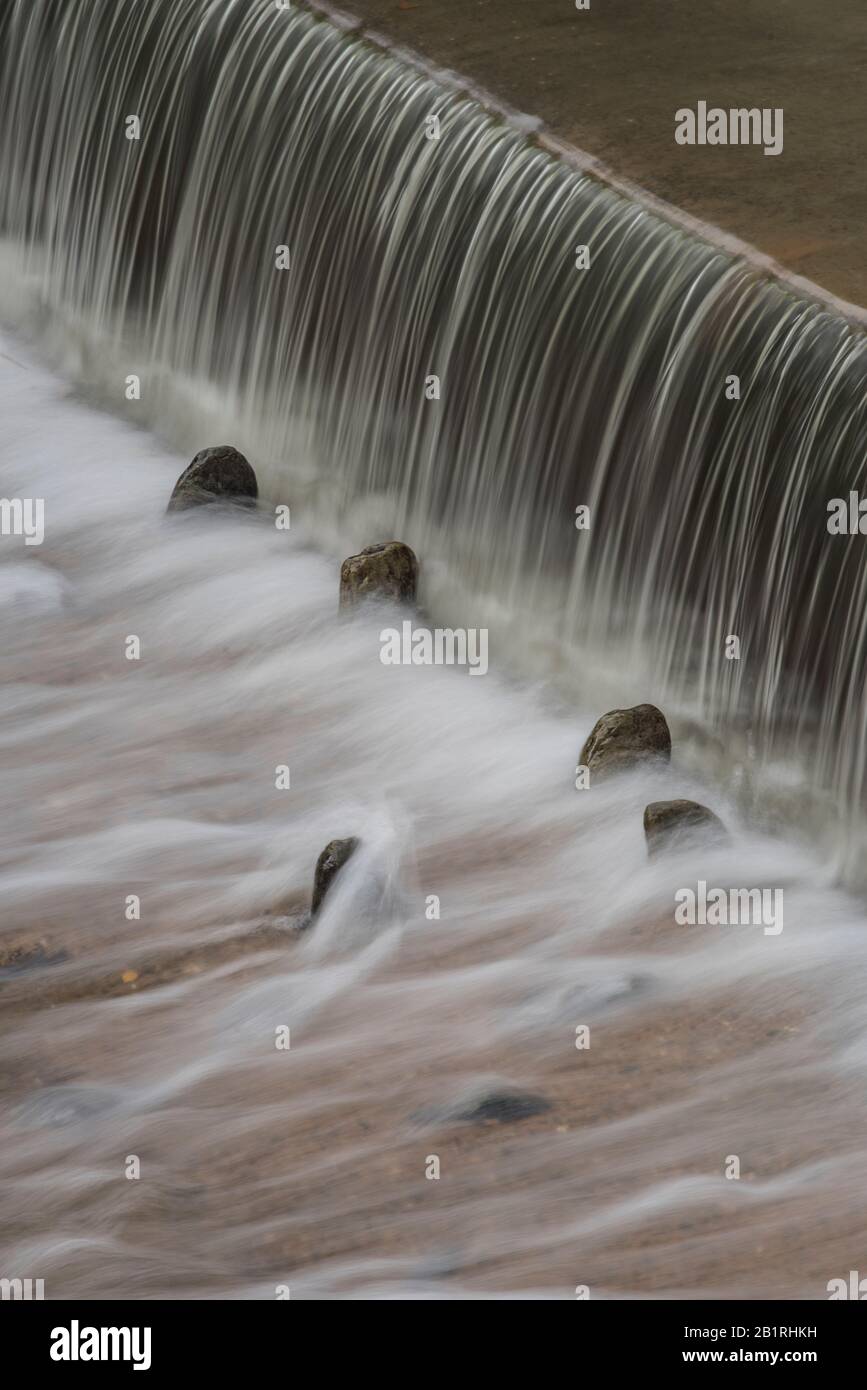 Water flowing over a stepped weir at Laxey on the Isle of Man, UK Stock ...