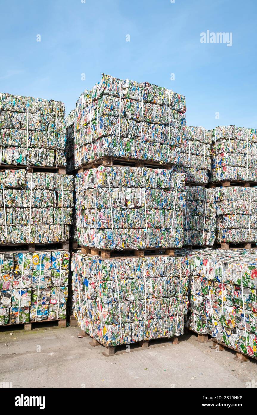 Bundles of consumer waste metal stacked for shipping to recycling ...