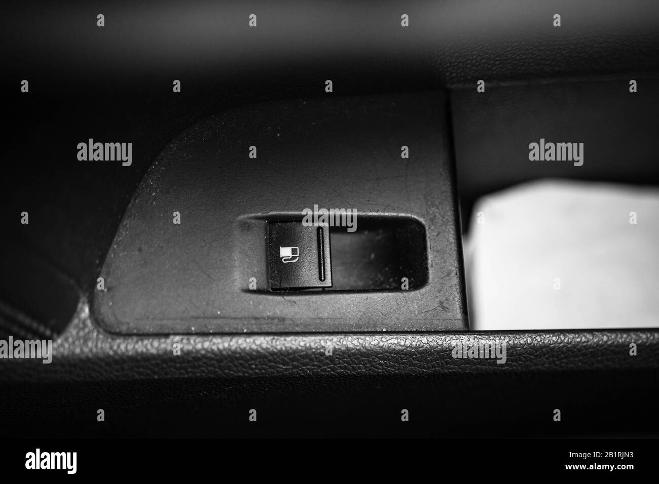 Close up photo inside a car, fuel pump button Stock Photo - Alamy