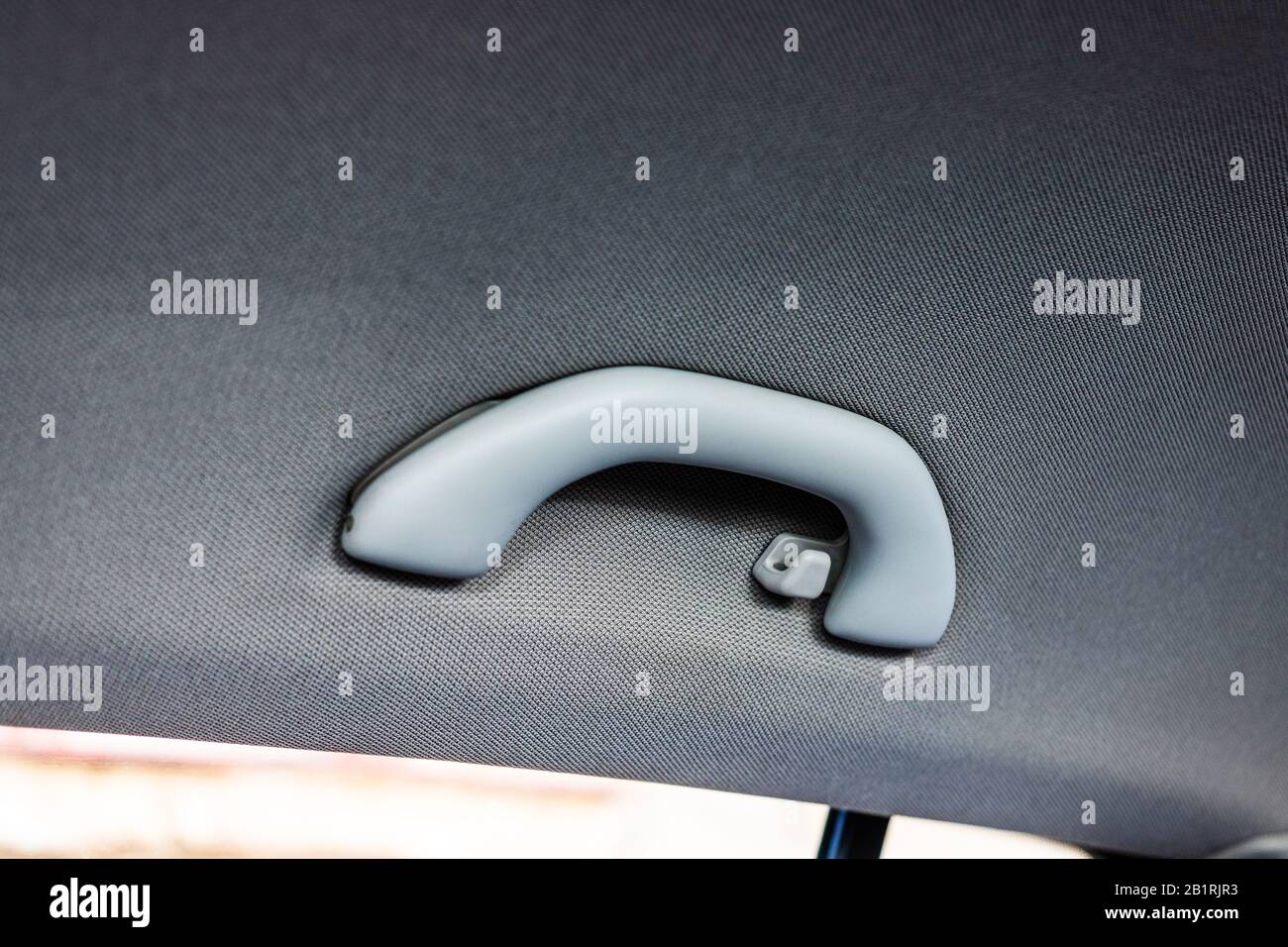 Close up photo inside a car, roof handle isolated Stock Photo - Alamy