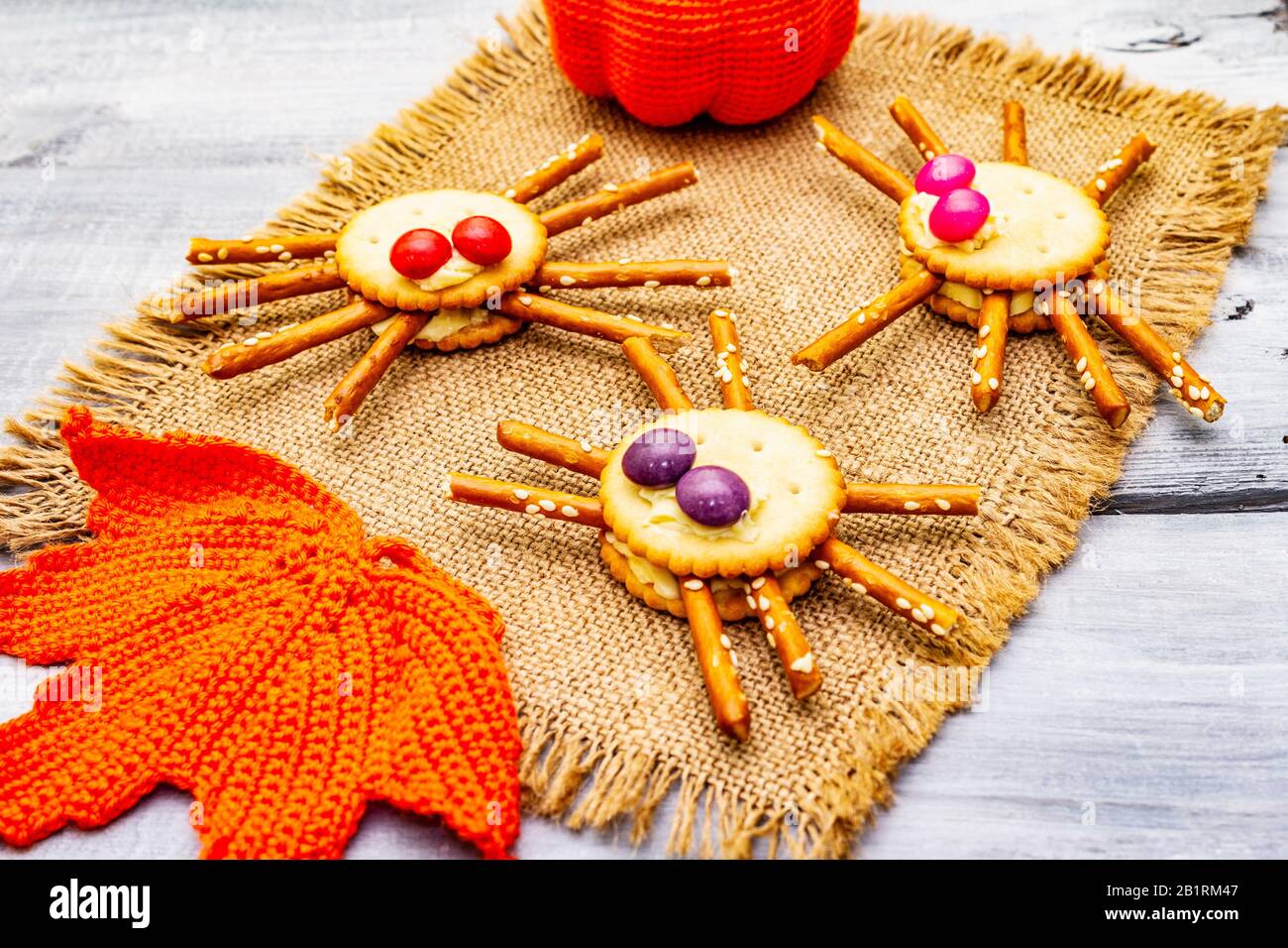 Funny kids food. Edible spiders from cookies, small candies and sweet ...